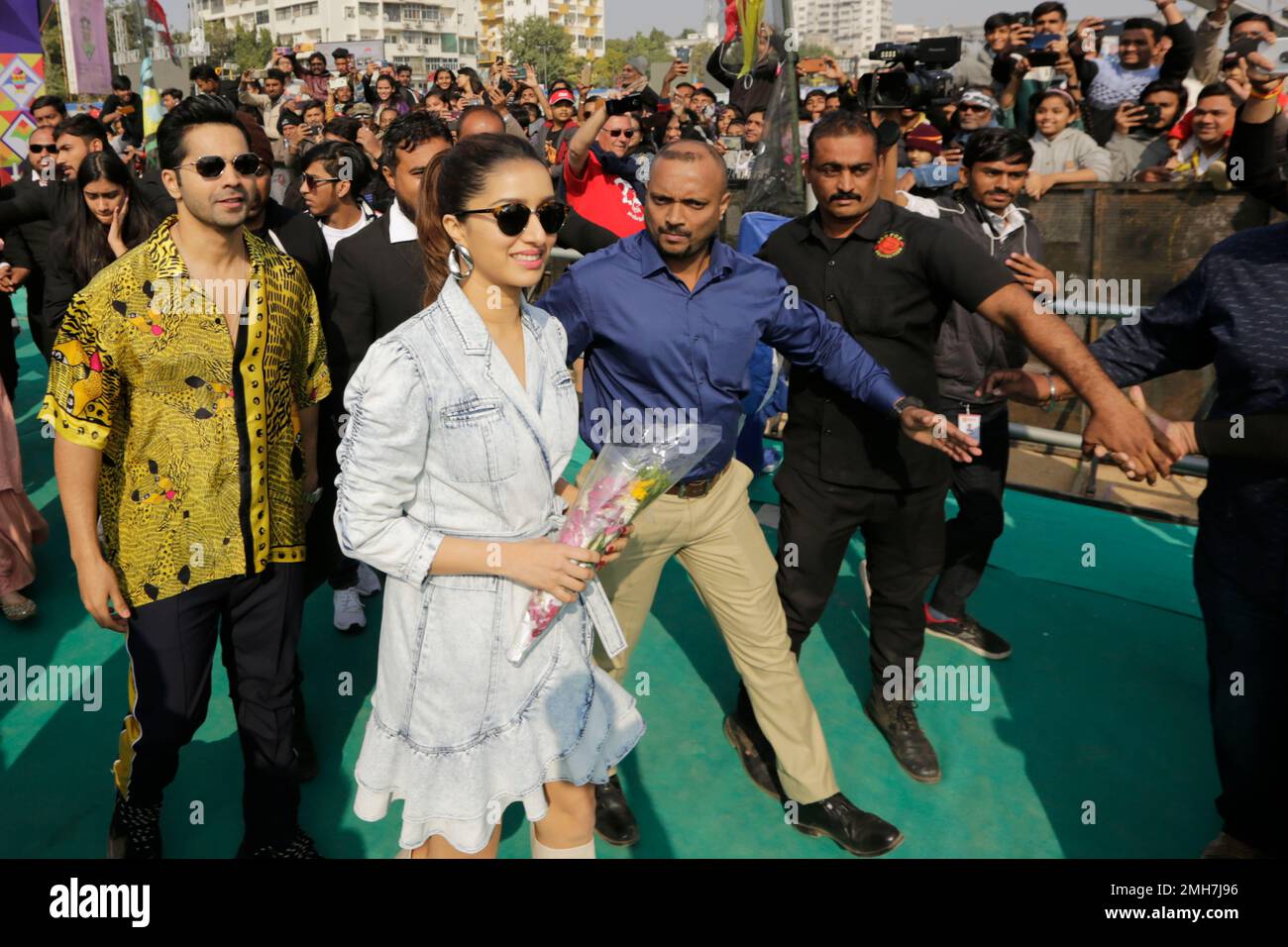 Bollywood actors Varun Dhawan, left, and Shraddha Kapoor arrive to ...