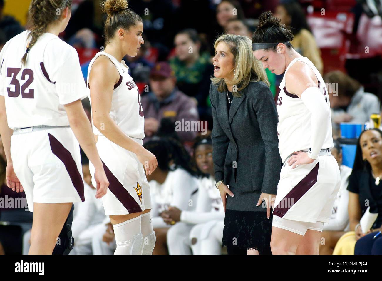 Arizona State head coach Charlie Turner Thorne talks with Arizona State ...
