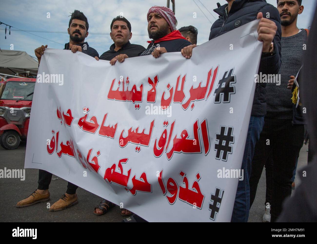 Anti government Iraqi protesters chant anti Iran and anti U.S. slogans ...