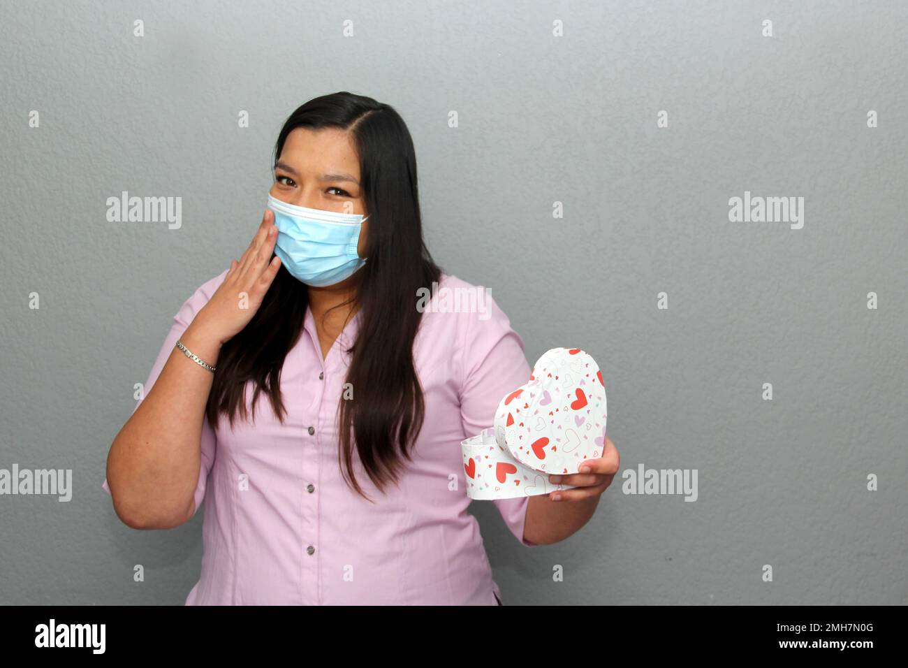 Valentine's day in contingency covid-19.latin woman with protection ...
