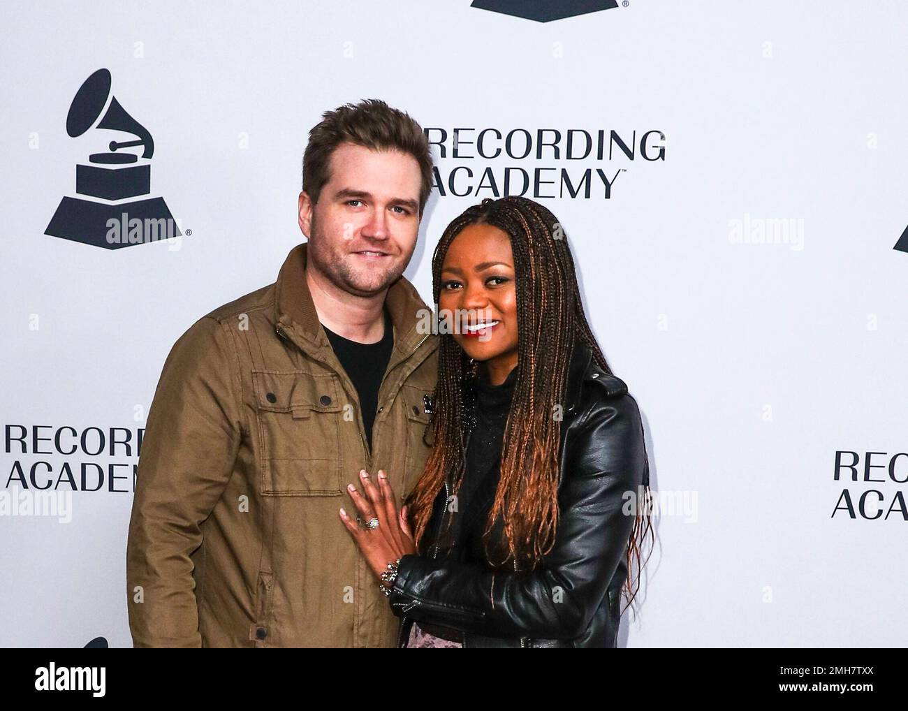 Sam Ashworth, left, and Ruby Amanfu arrive at the 62nd Annual GRAMMY ...