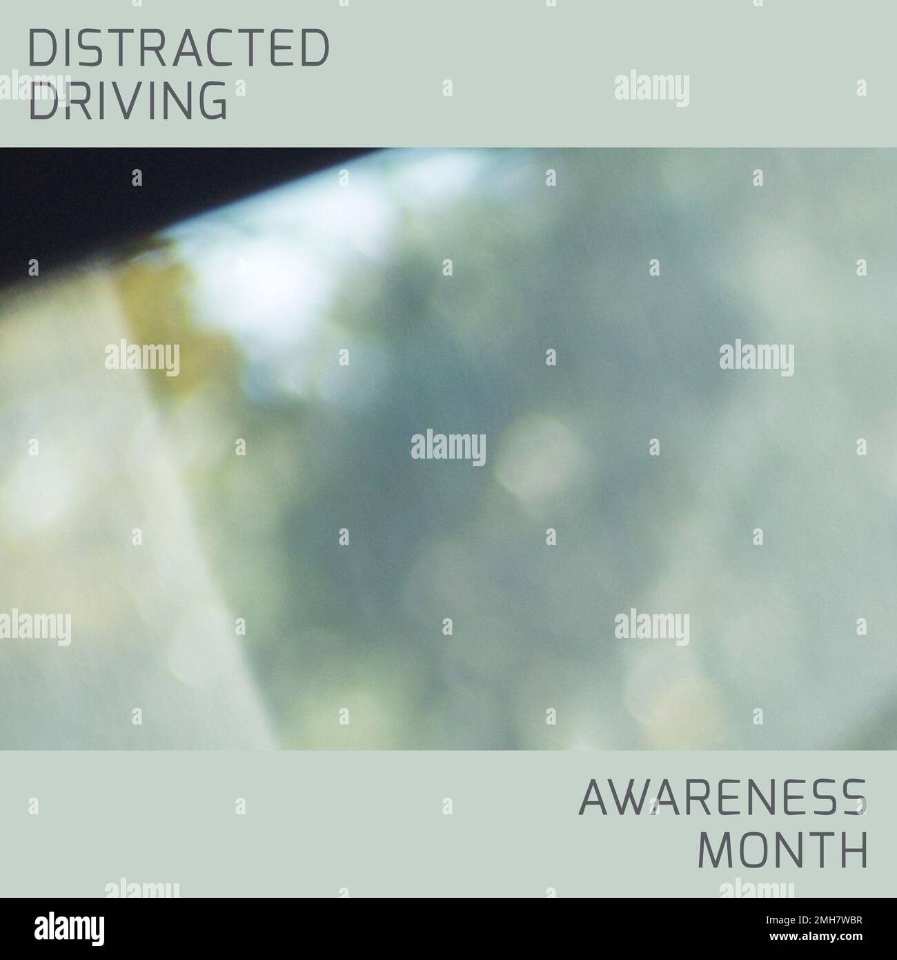 Composition of distracted driving awareness month text over blurred ...