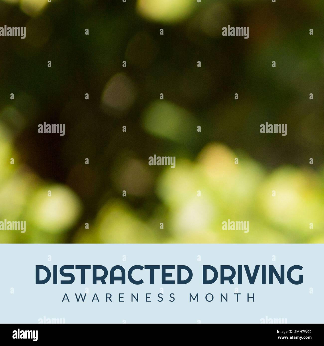 Composition of distracted driving awareness month text over blurred ...