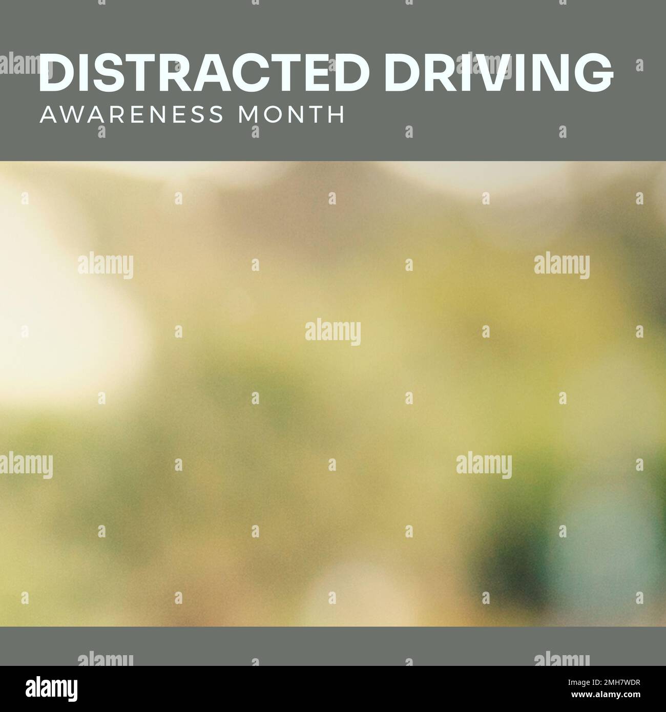 Composition of distracted driving awareness month text over blurred ...