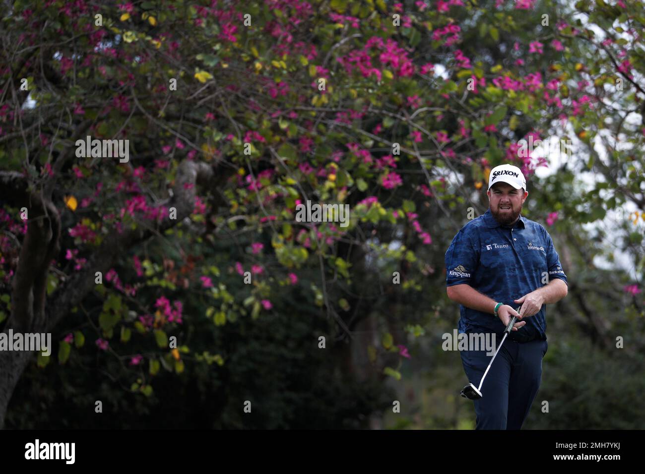 Shane Lowry of the United States watches his shot during the Hong Kong ...