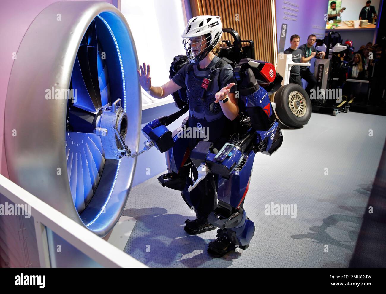 Tara Scranton demonstrates the Sarcos Robotics Guardian XO at the Delta ...