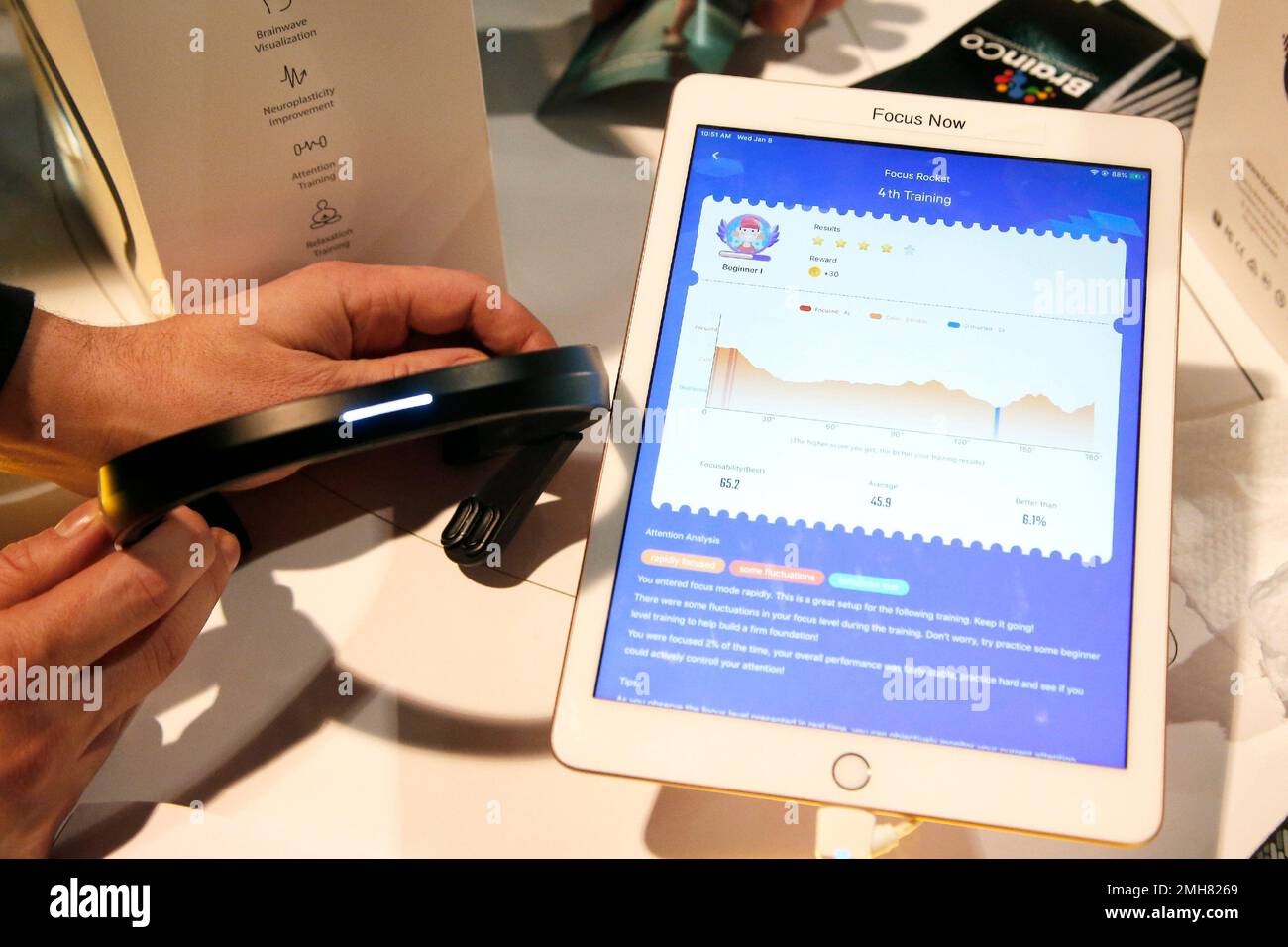 The BrainCo brainwave-sensing headband, left, and the software platform ...