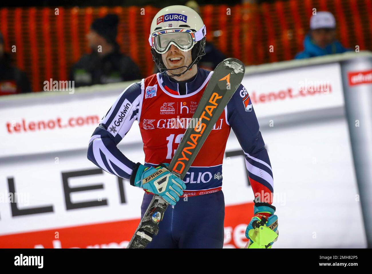 Britain's Dave Ryding celebrates after crossing the finish line of an ...