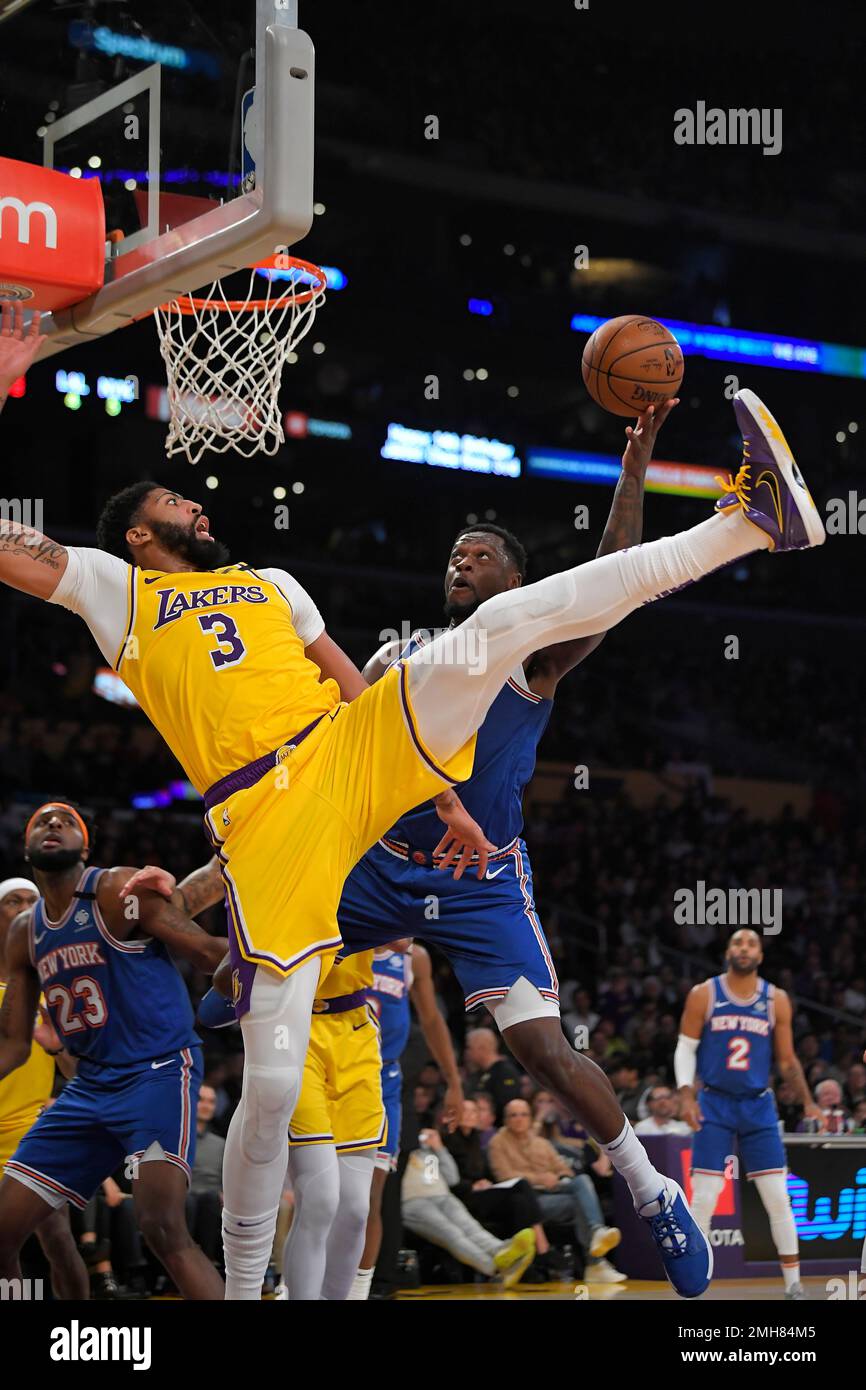 New York Knicks forward Julius Randle, right, shoots as Los Angeles ...