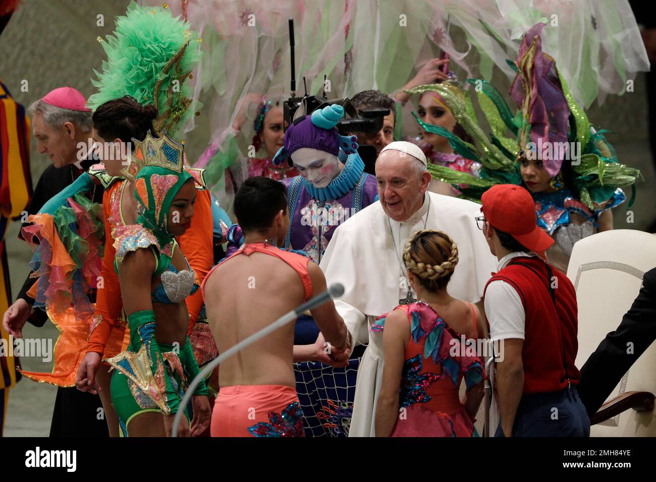 Pope Francis salutes the artists of the "Aqua" Cuban circus during his ...