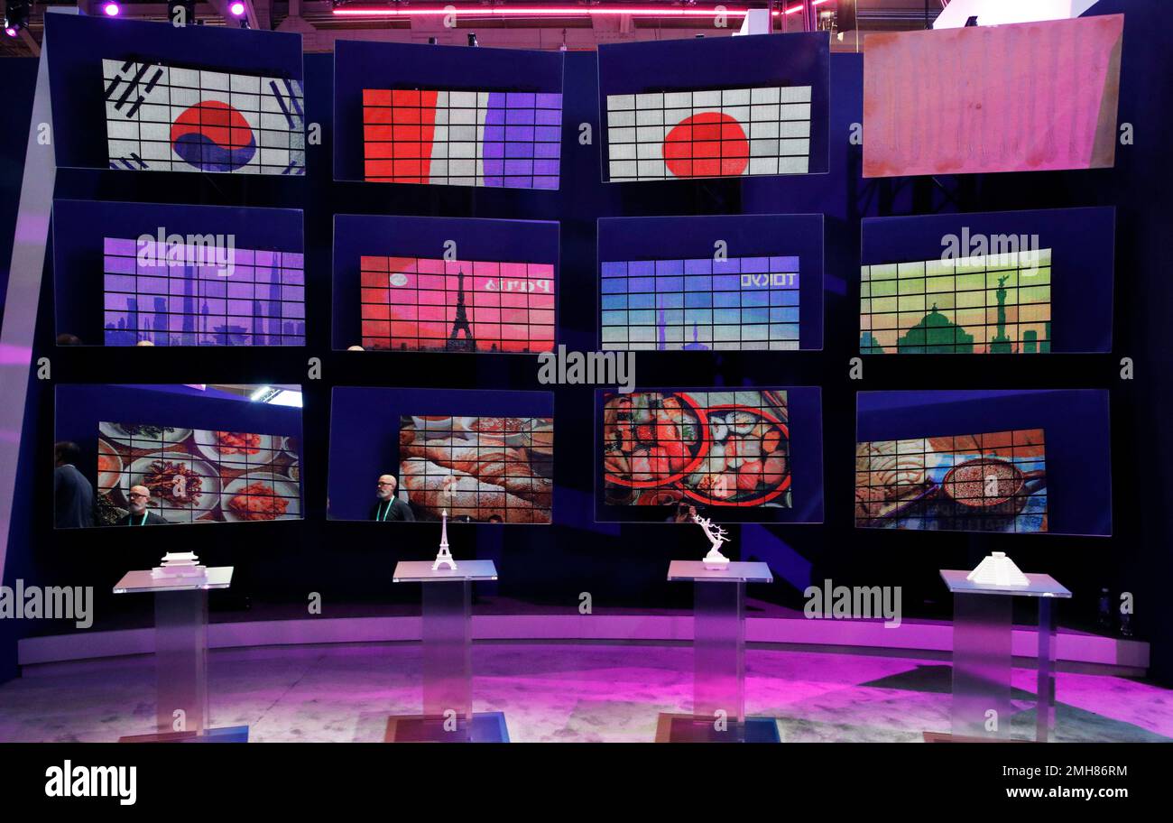 A set of mirrors all reflect the same display that shows different ...