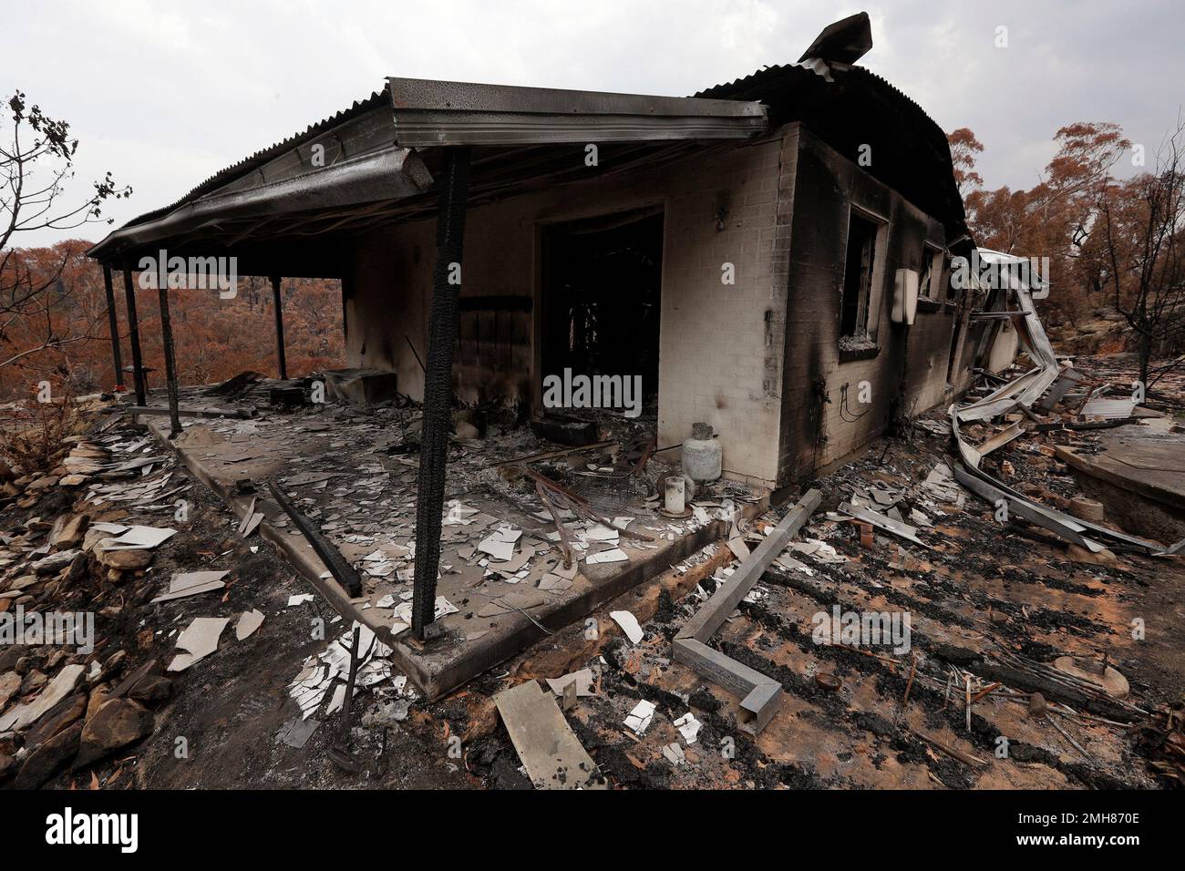 The home of Justin Kam and Helena Wong barely stands after a fire ...
