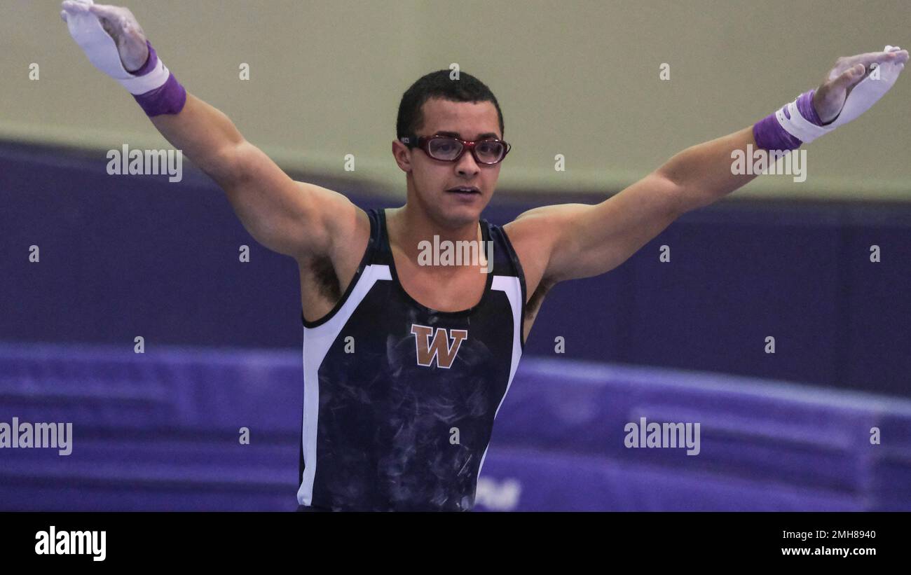 Washington's Jacob Jarrett competes on the rings during the Washington ...