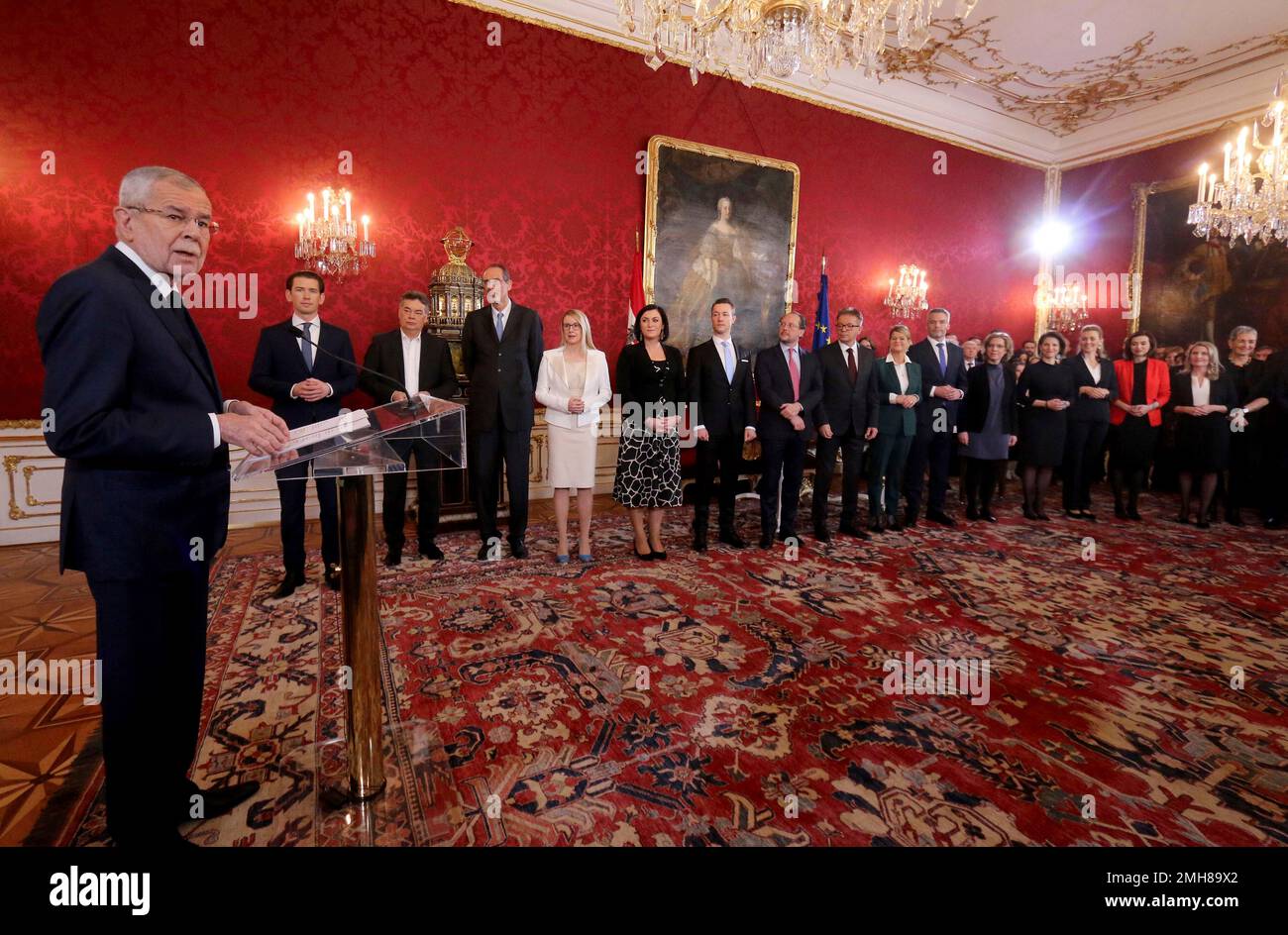Austrian President Alexander Van Der Bellen, left, delivers a speech ...