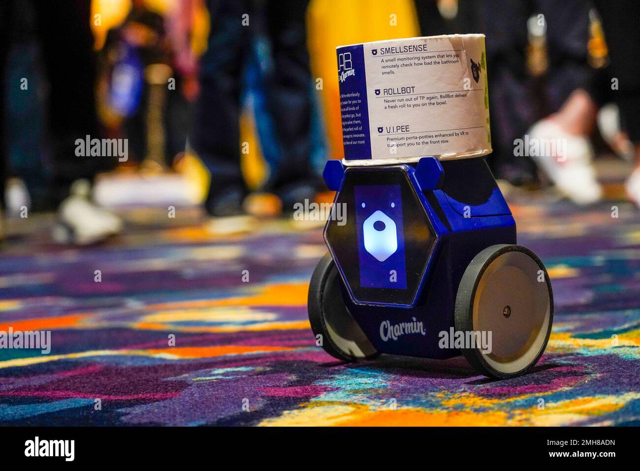 RollBot, a toilet paper-carrying droid developed by Charmin and Unit 9, carries a roll of toilet ...