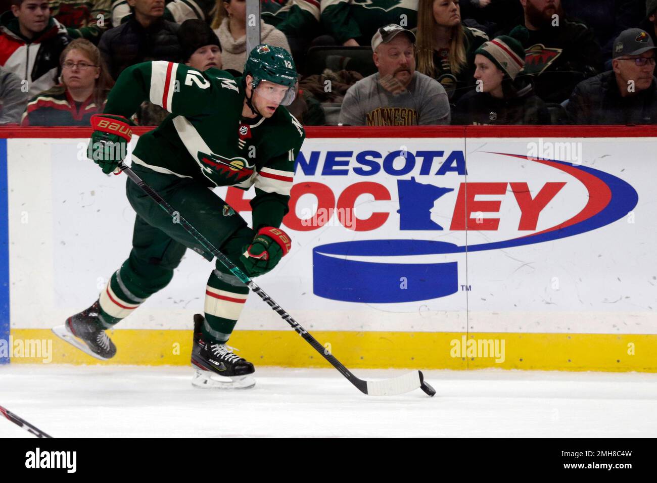 Minnesota Wild center Eric Staal controls the puck against the Calgary ...