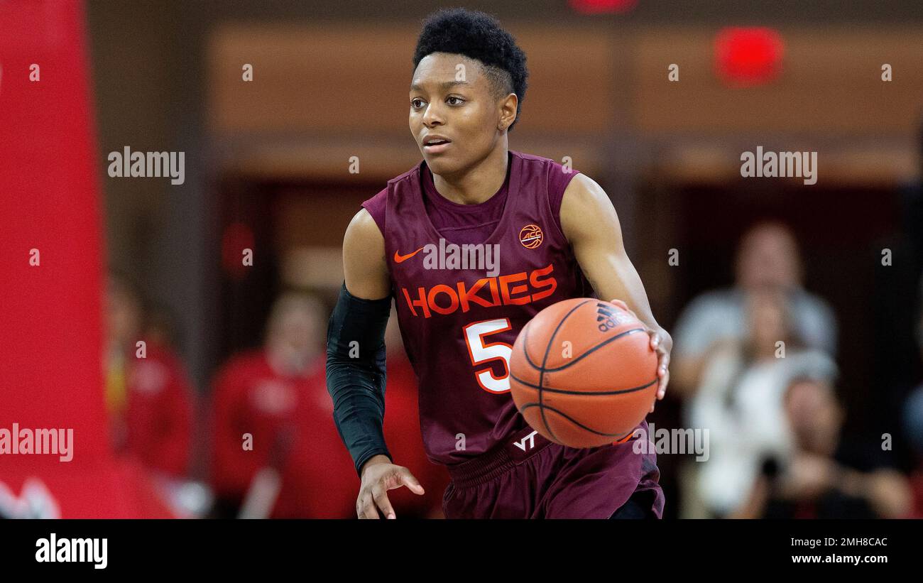 Virginia Tech's Taja Cole (5) handles the ball during an NCAA college ...