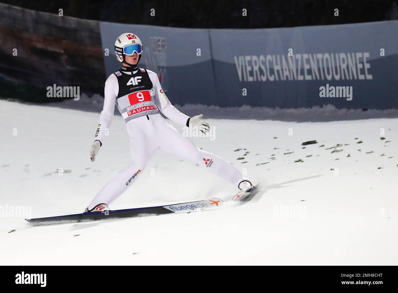 Marius Lindvik of Norway lands after his final jump at the fourth and ...