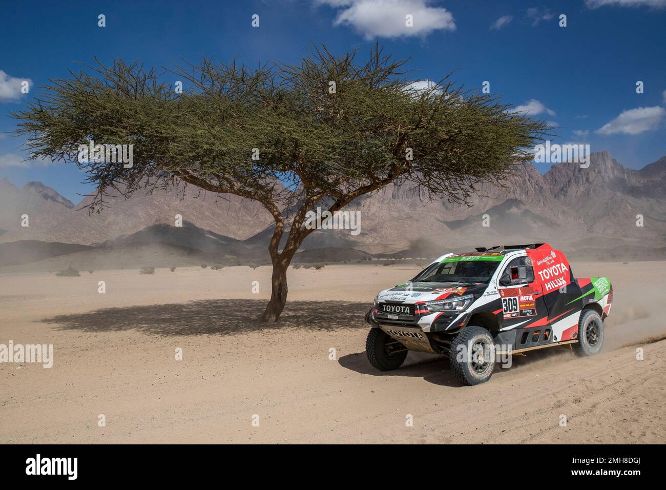Driver Yazeed Al Qassimi, of Saudi Arabia, and co-driver Konstantin ...