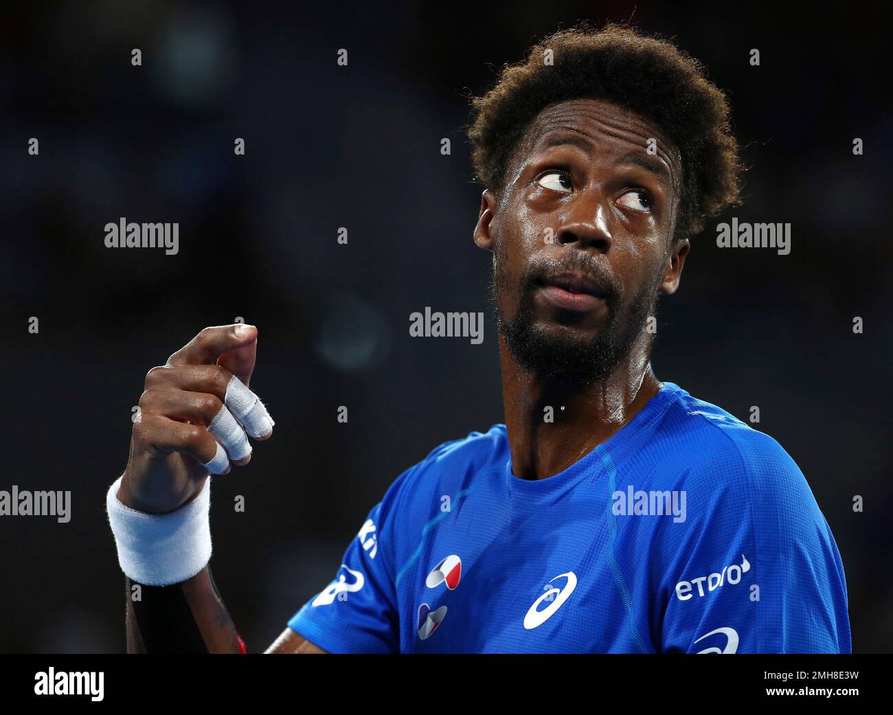 Gael Monfils of France talks to the umpire during his match against ...