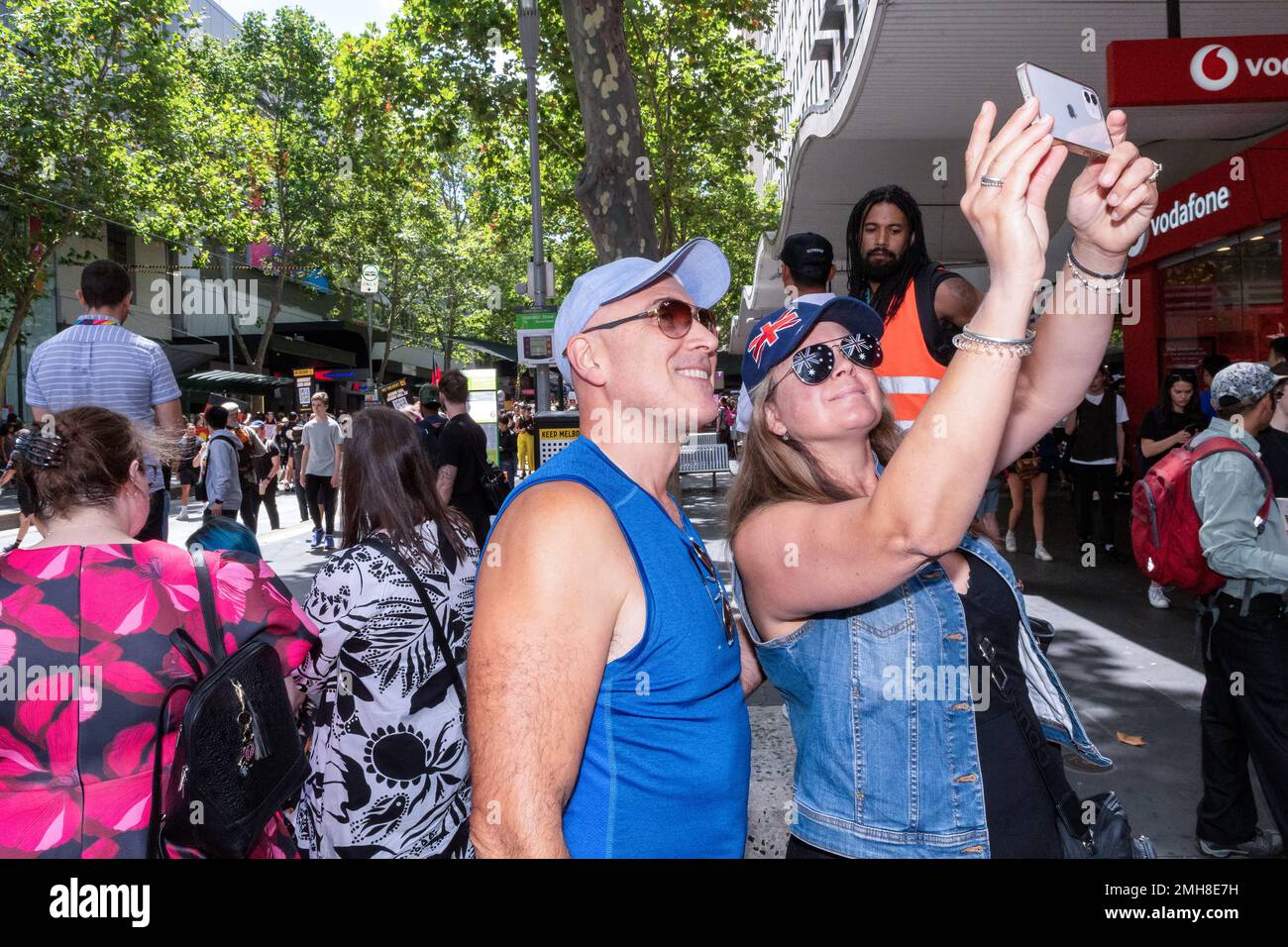 Melbourne, Australia, 26 January, 2023. A man and a woman take a selfie ...