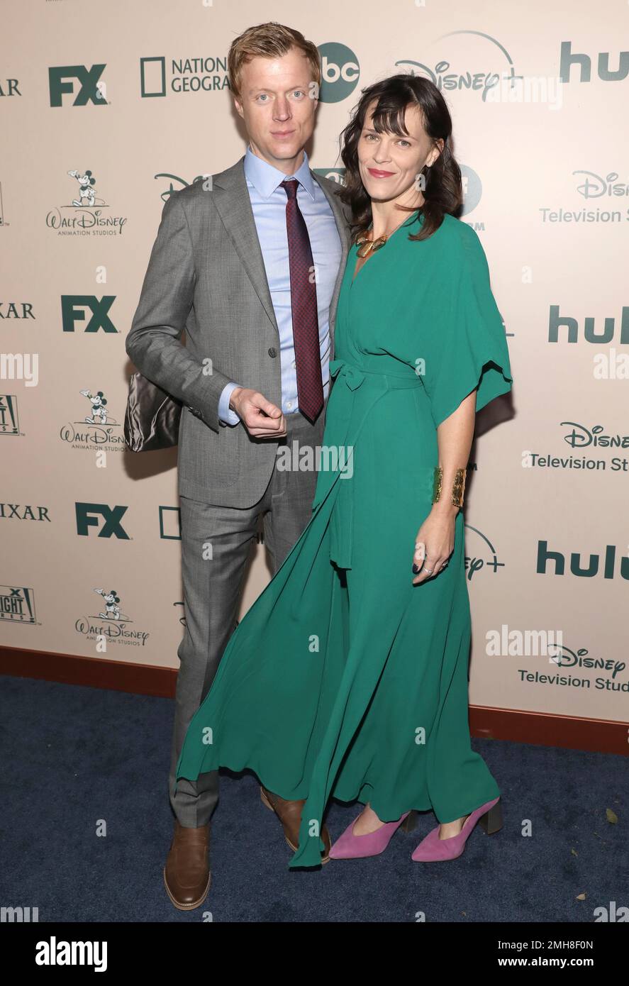 Jay Paulson, left, and Courtney Kohl arrive at the FX and Disney Golden ...