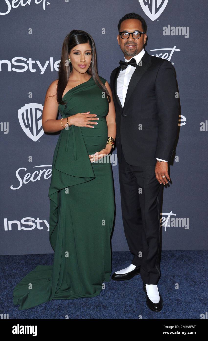 Kyra Robinson, left, and Mike Epps arrive at the InStyle and Warner ...