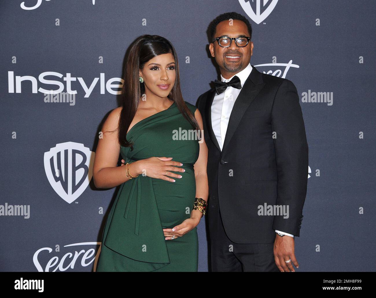 Kyra Robinson, left, and Mike Epps arrive at the InStyle and Warner ...