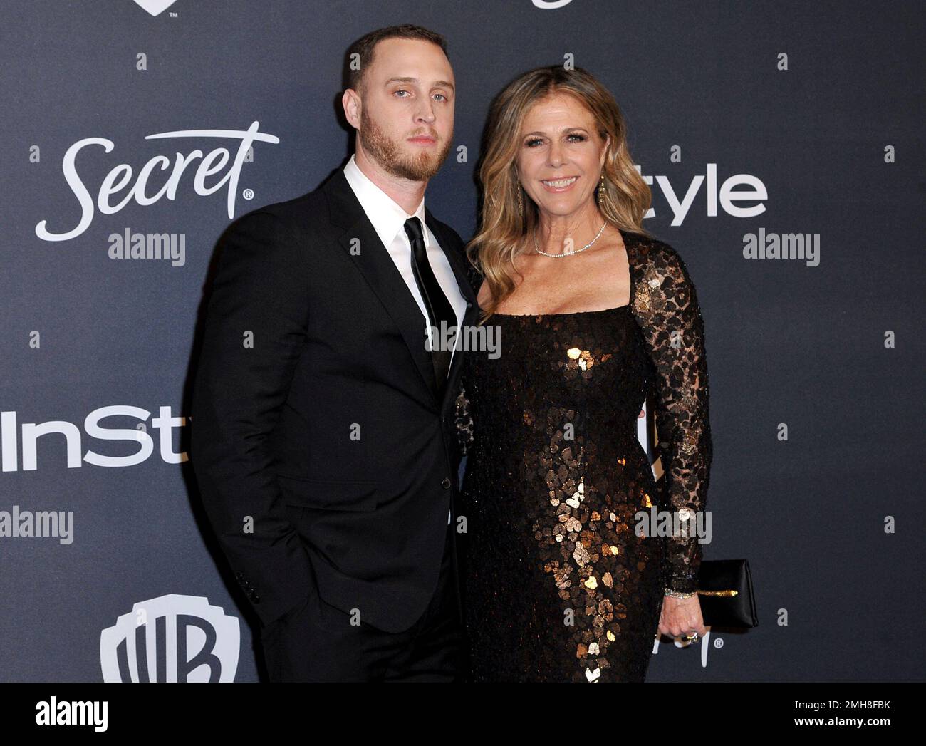 Chet Hanks, left, and Rita Wilson arrive at the InStyle and Warner Bros ...