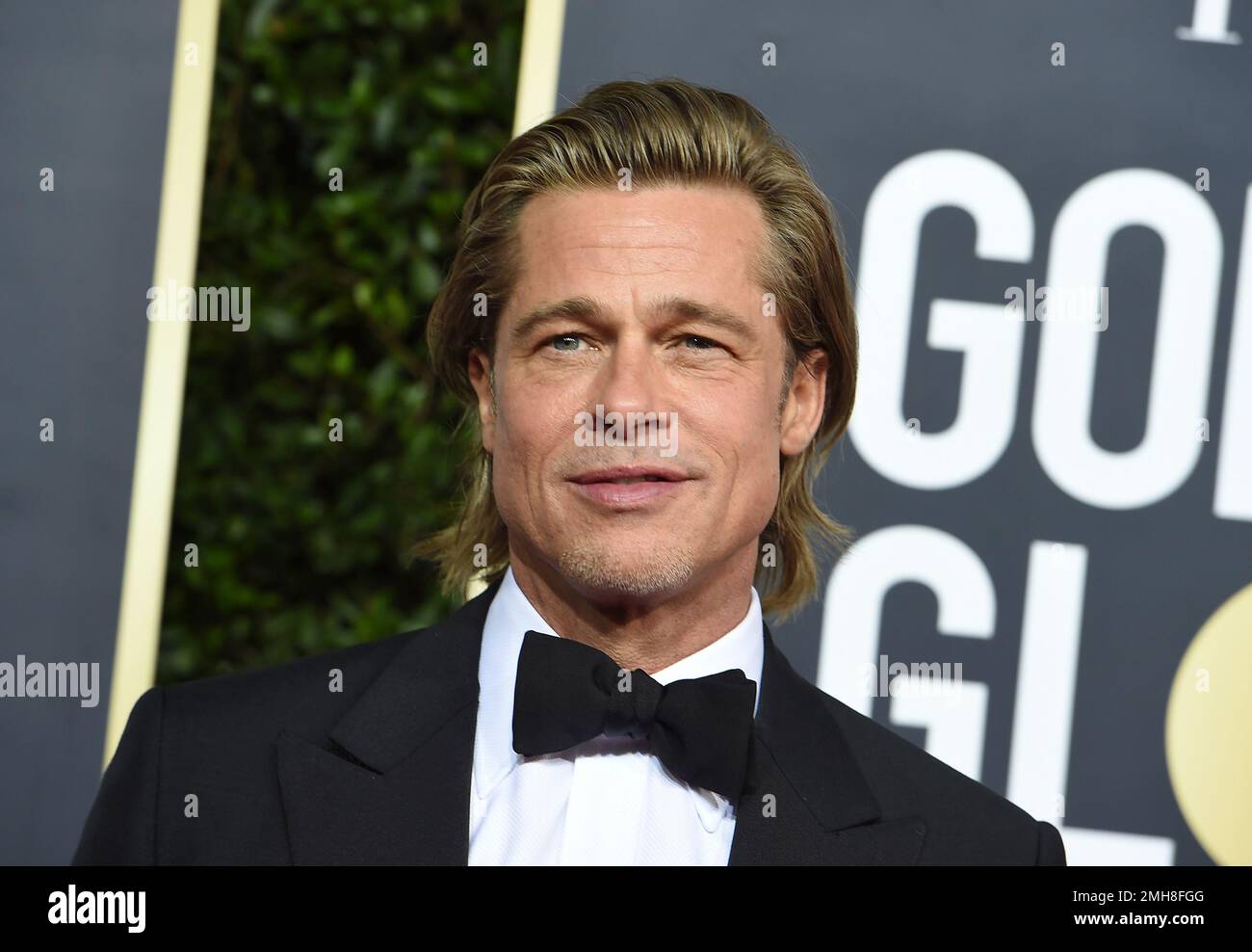 Brad Pitt arrives at the 77th annual Golden Globe Awards at the Beverly ...