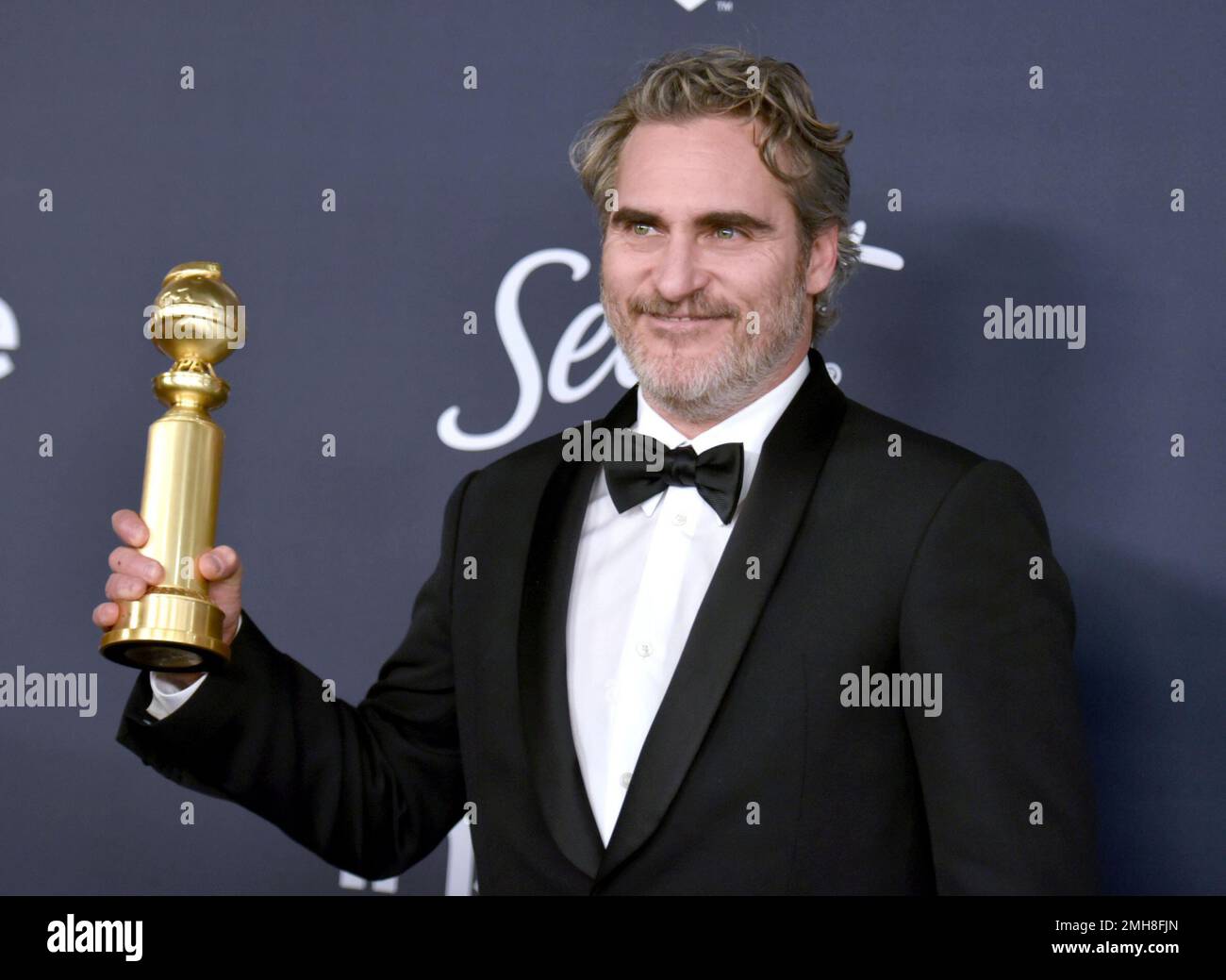 Joaquin Phoenix, winner of the award for best performance by an actor ...