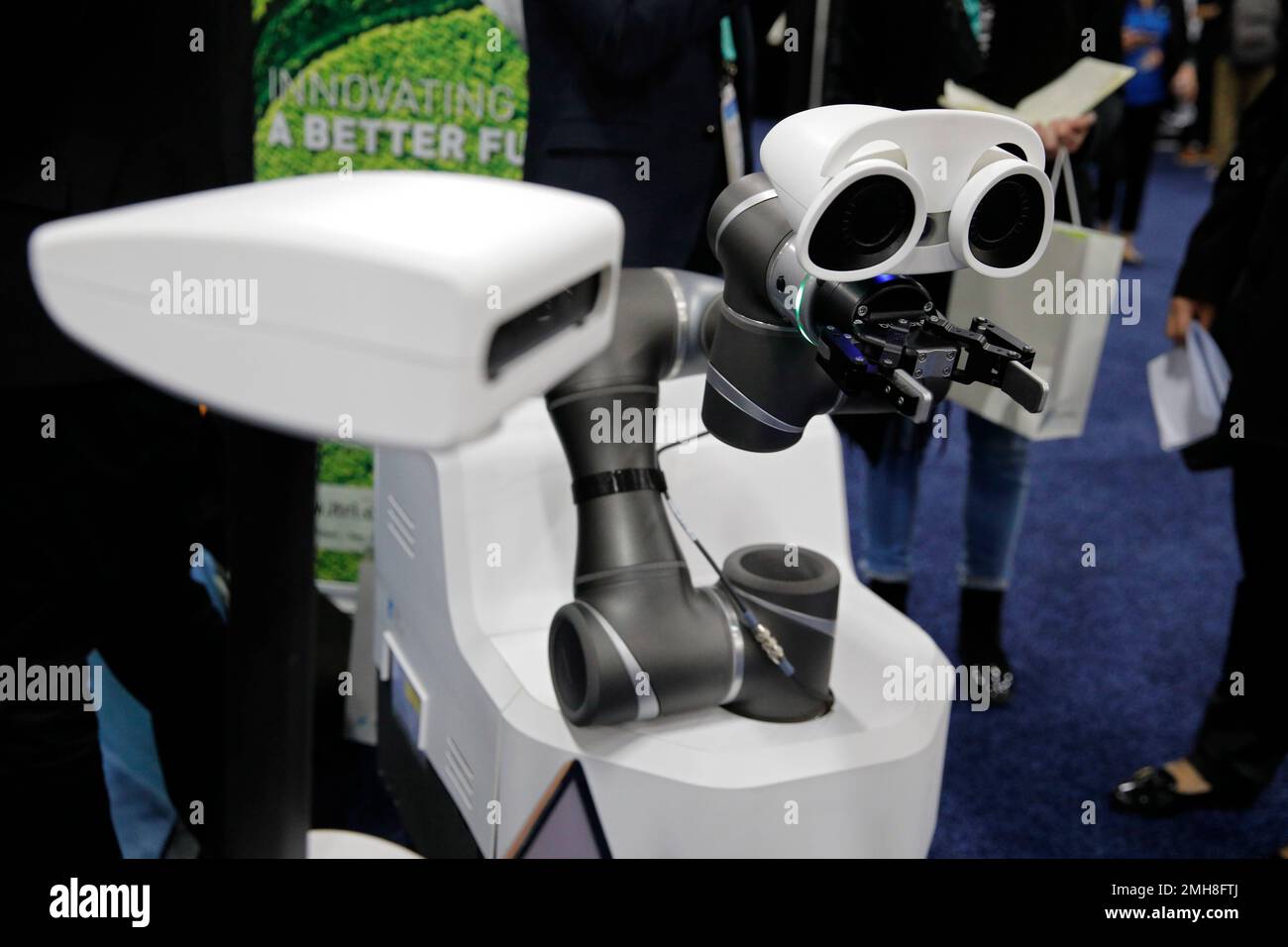 The Mobile Arm Robot System is on display at the Industrial Technology ...