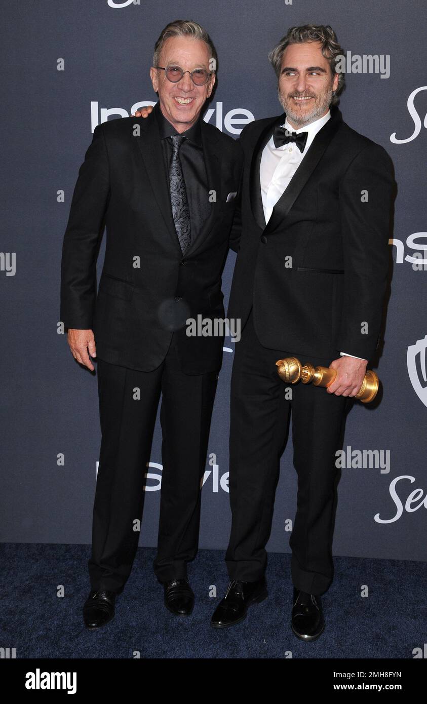 Tim Allen, left, and Joaquin Phoenix, winner of the award for best ...