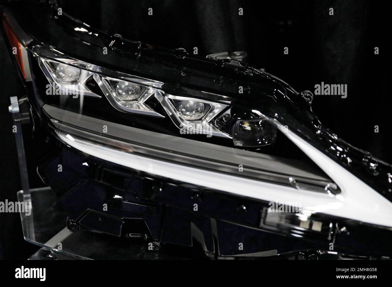 The BladeScan smart adaptive headlight is on display at the Koito and ...