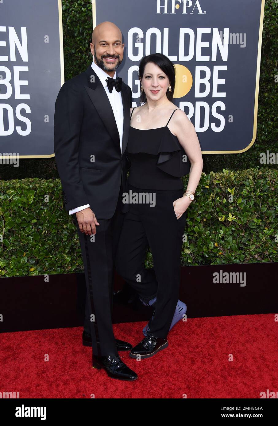 Keegan-Michael Key, left, and Elisa Key arrive at the 77th annual ...