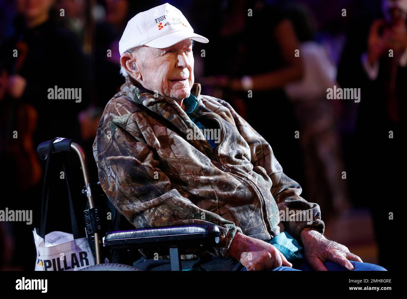 General Chuck Yeager is shown as he is honored before the start of an ...
