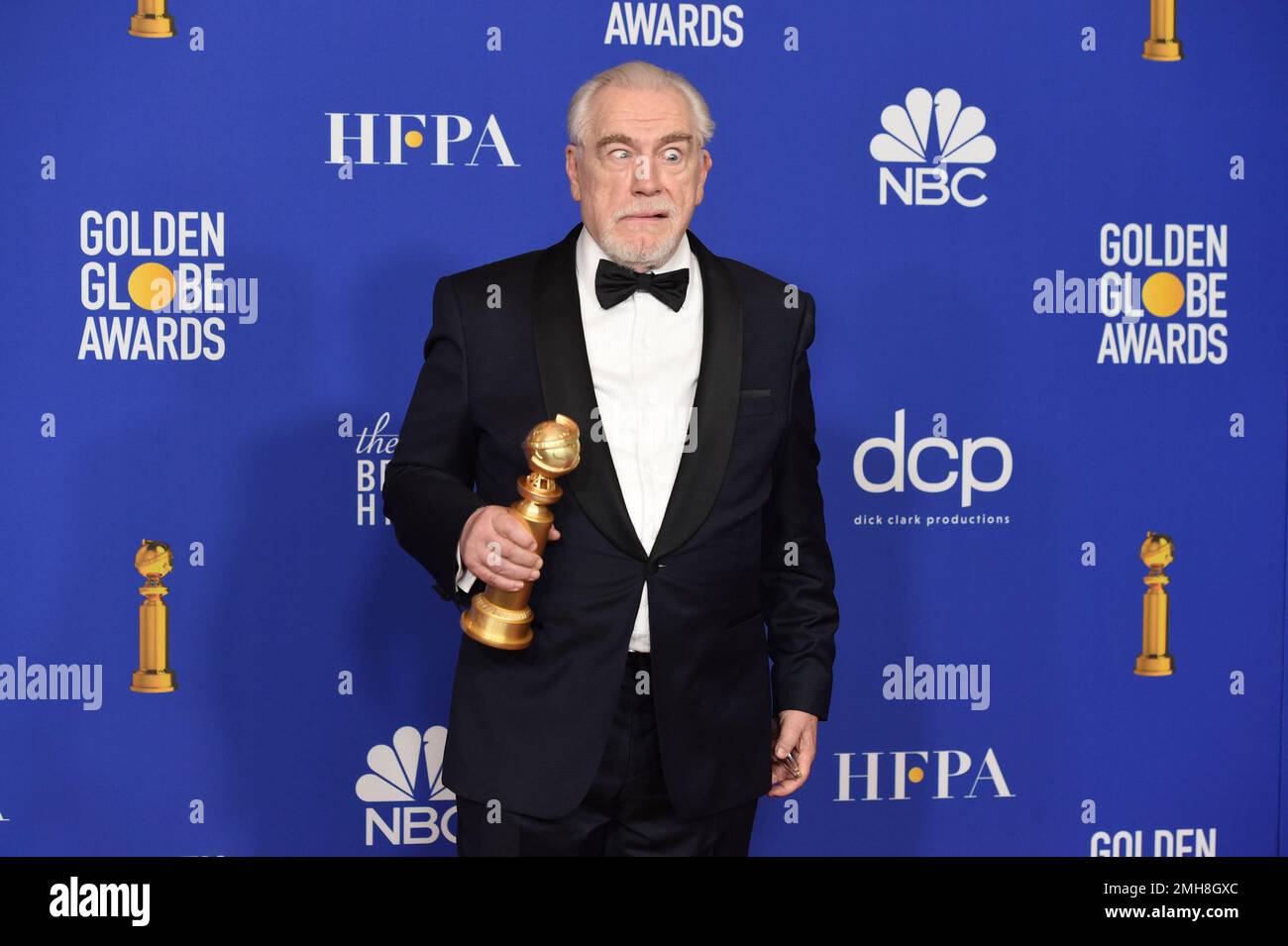 Brian Cox poses in the press room with the award for best performance ...