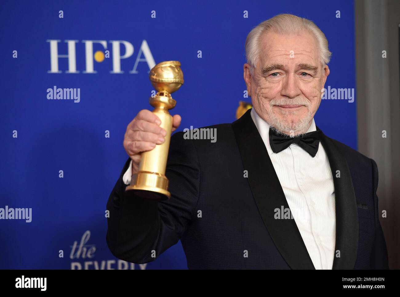 Brian Cox poses in the press room with the award for best performance ...