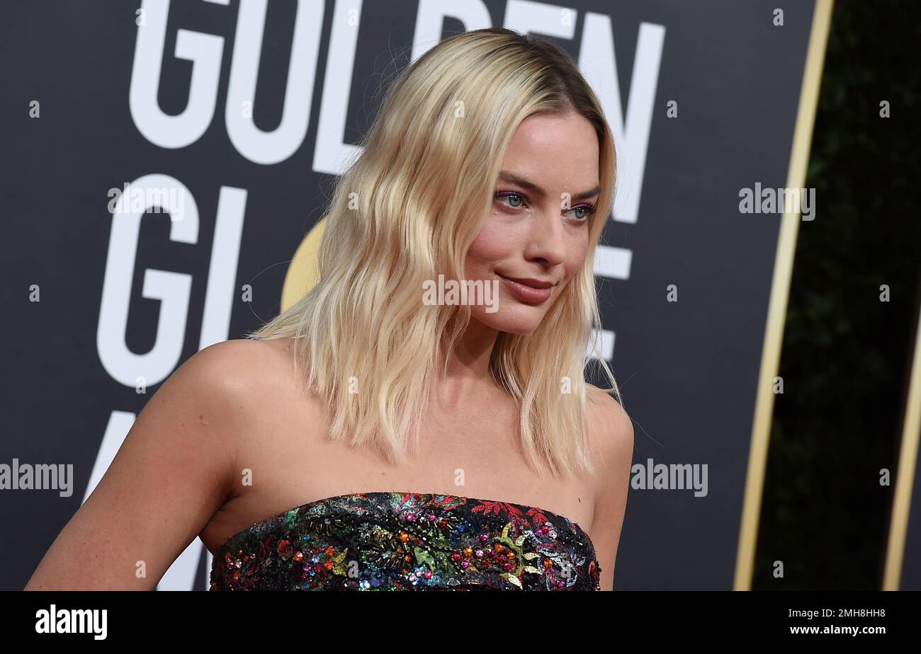 Margot Robbie arrives at the 77th annual Golden Globe Awards at the ...