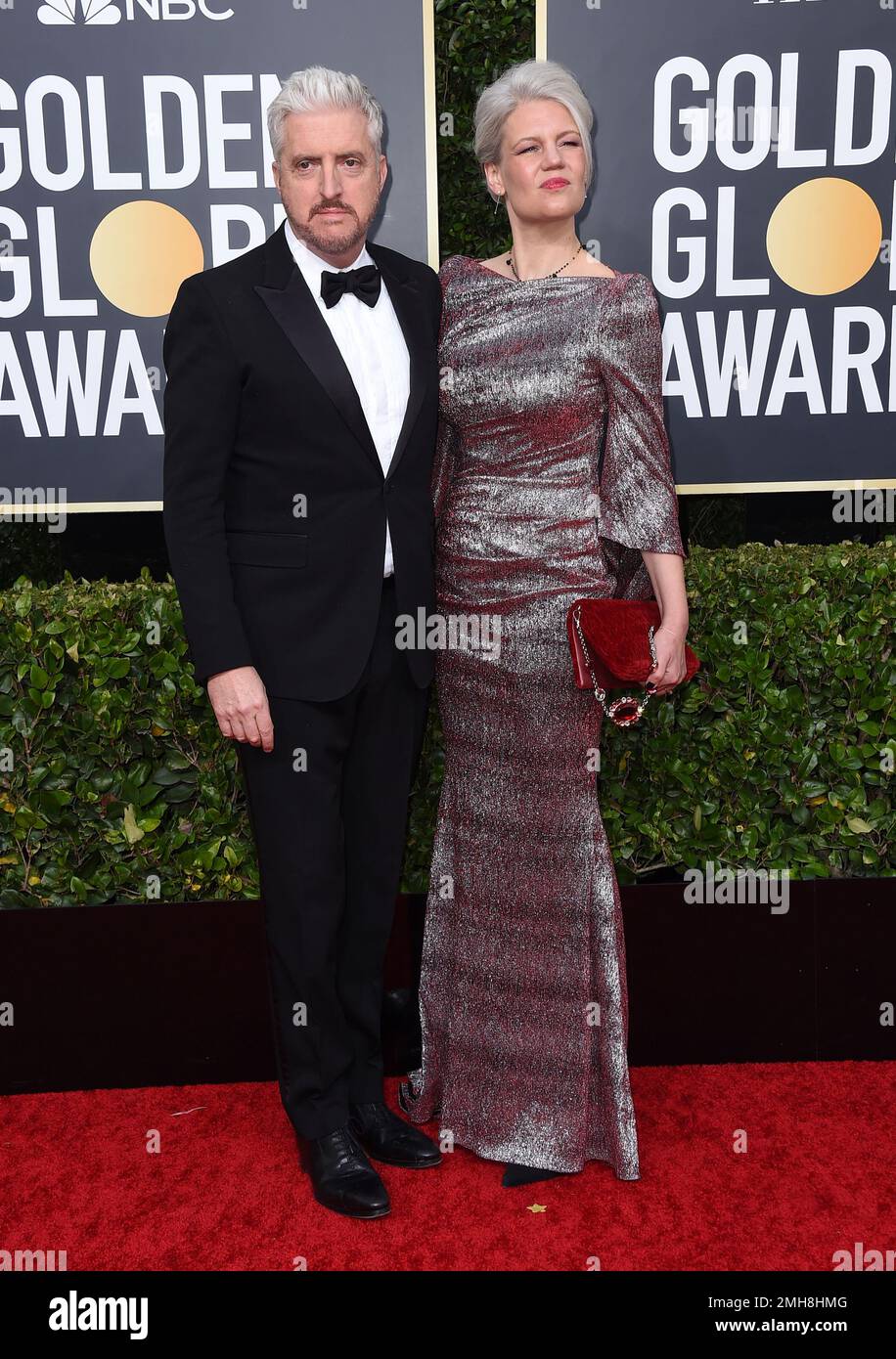 Anthony McCarten, left, and Eva Maywald arrive at the 77th annual ...