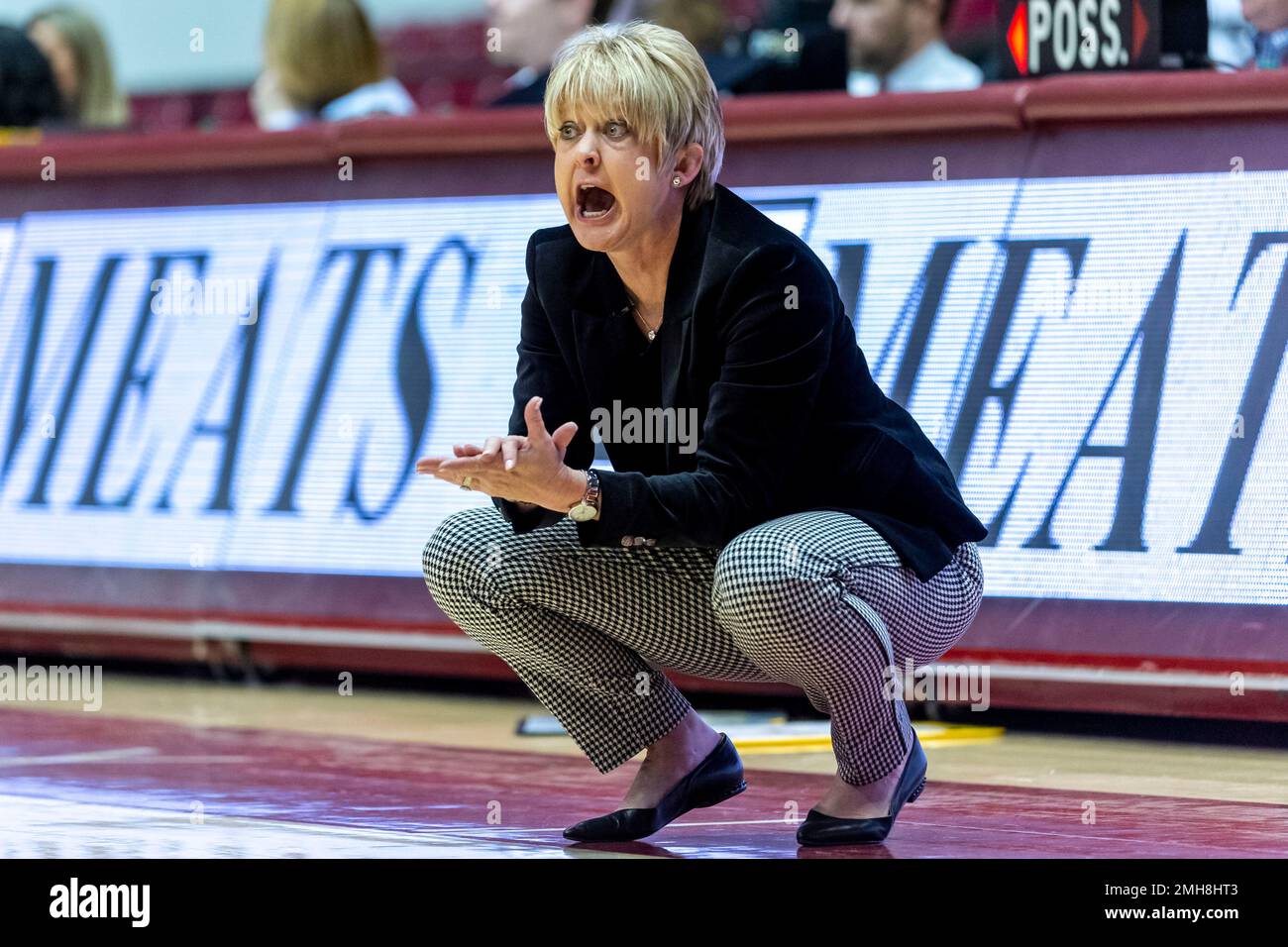 Alabama head coach Kristy Curry yells in to her team during the first ...