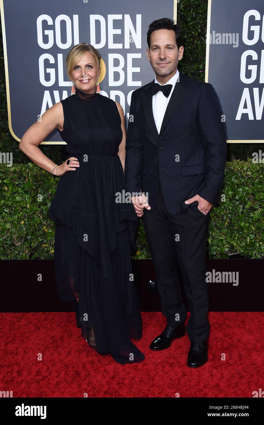 Julie Yaeger, left, and Paul Rudda arrive at the 77th annual Golden ...