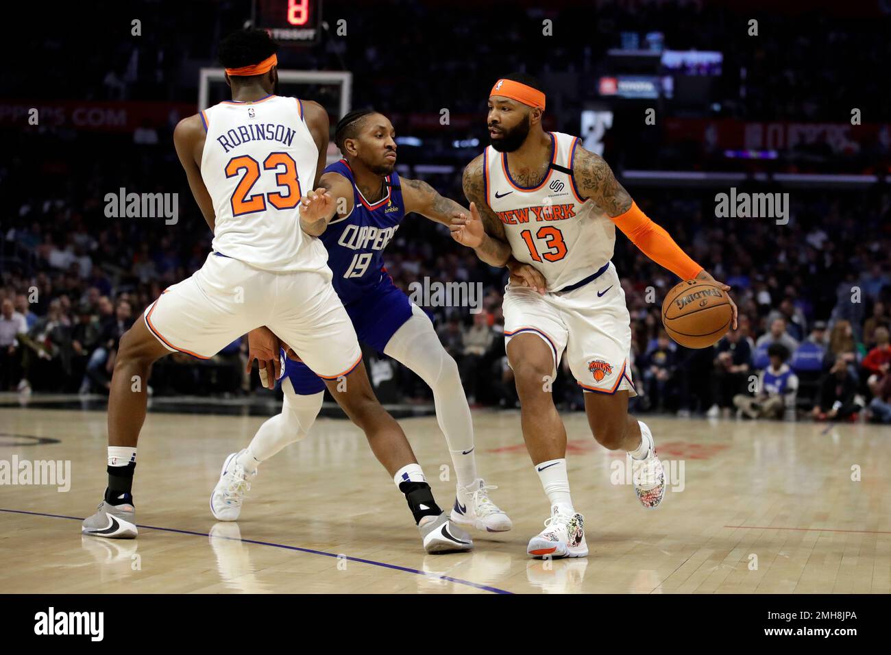New York Knicks' Marcus Morris Sr., dribbles around Los Angeles ...