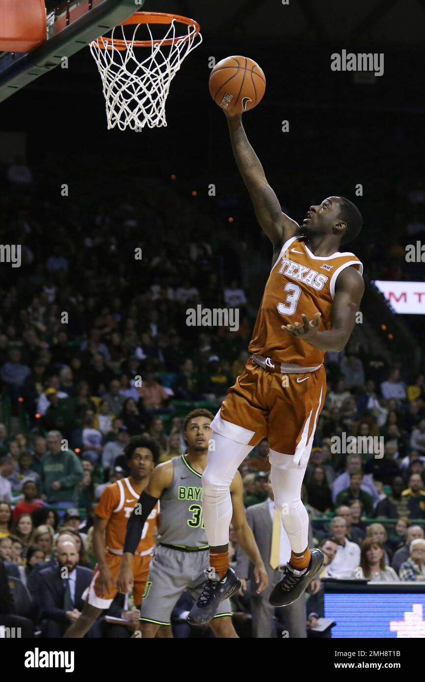 Texas guard Courtney Ramey, right, scores past Baylor guard MaCio ...