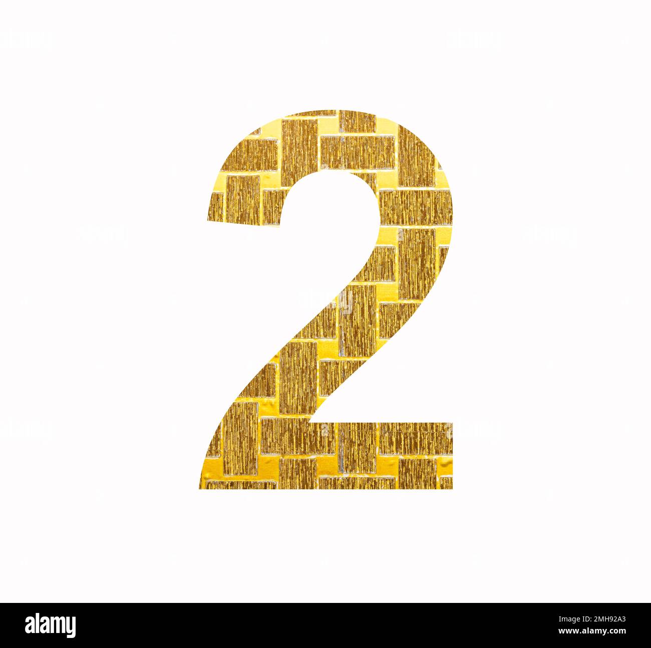 Number two in gold shiny textured paper Stock Photo - Alamy