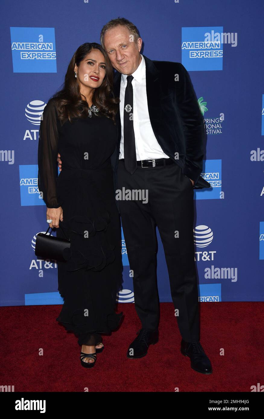 Salma Hayek, left, and Francois-Henri Pinault arrive at the 31st annual ...