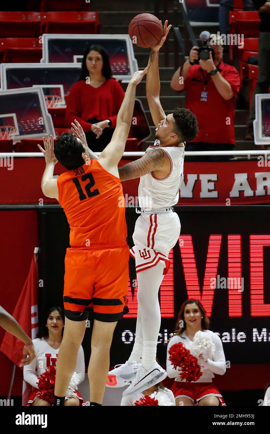 Utah forward Timmy Allen, right, shoots as Oregon State center Roman ...