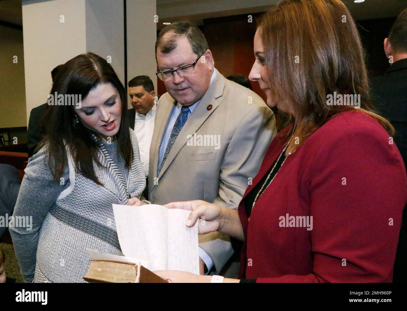 Southern District Public Service Commissioner Dane Maxwell, center ...