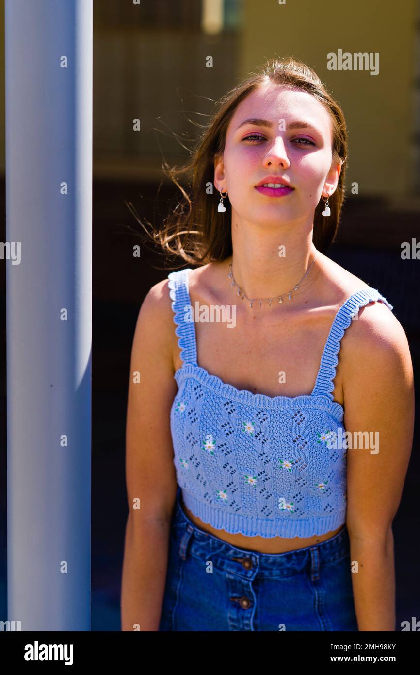Half Body Portrait of Flirty Looking Teenage Girl Standing with Hair ...