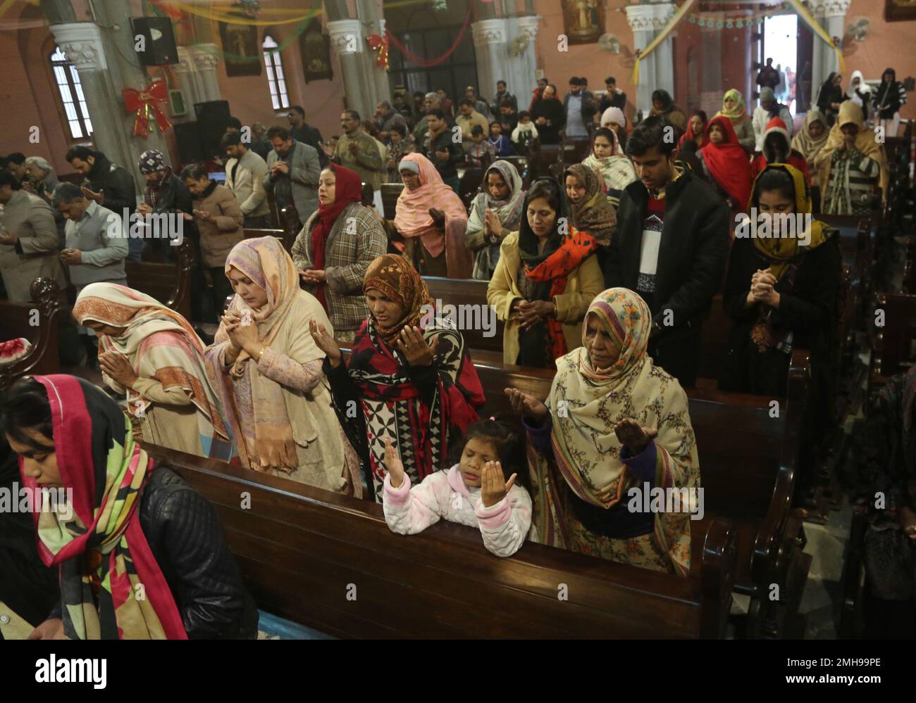 Pakistani Christians attend a special New Year service at the Catholic ...